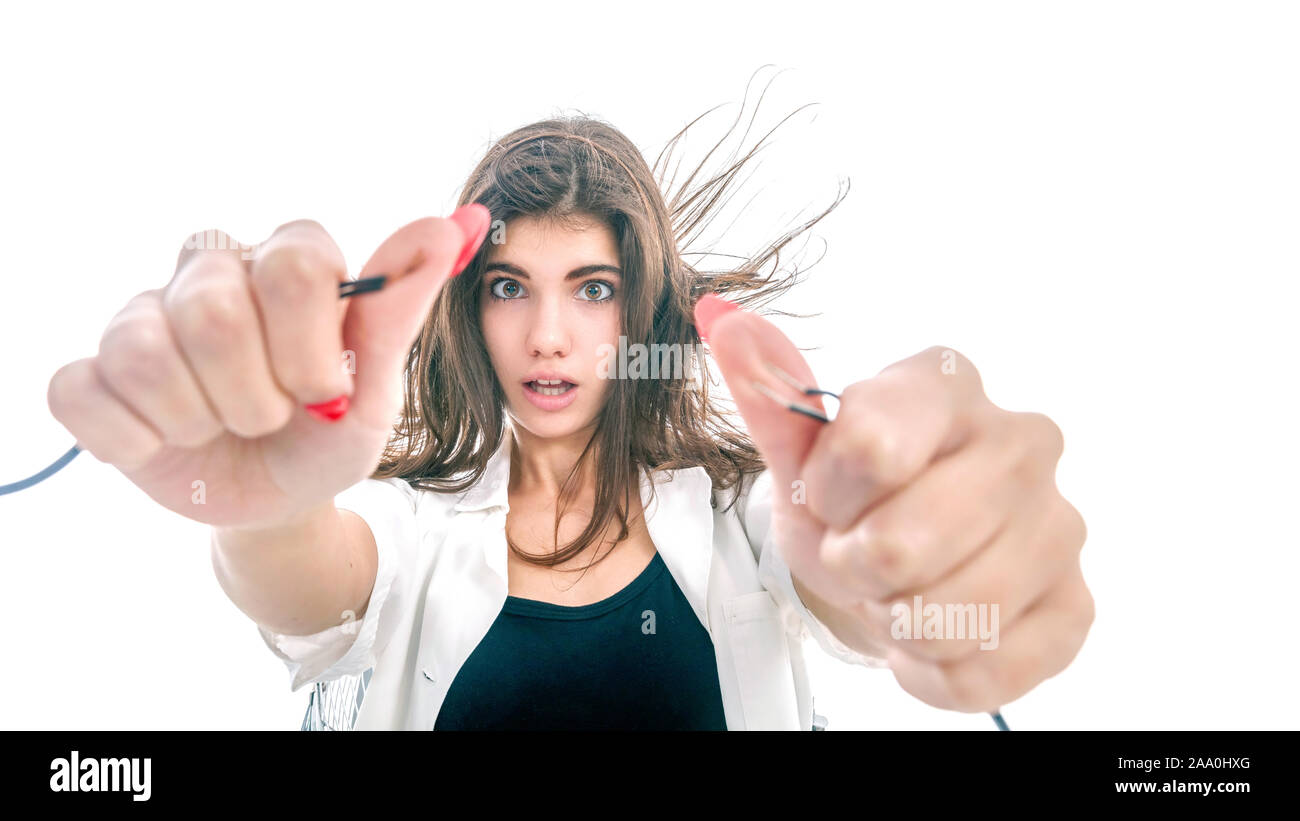 Girl having Electric Shock, electricity problems, Girl holds bare wires ...