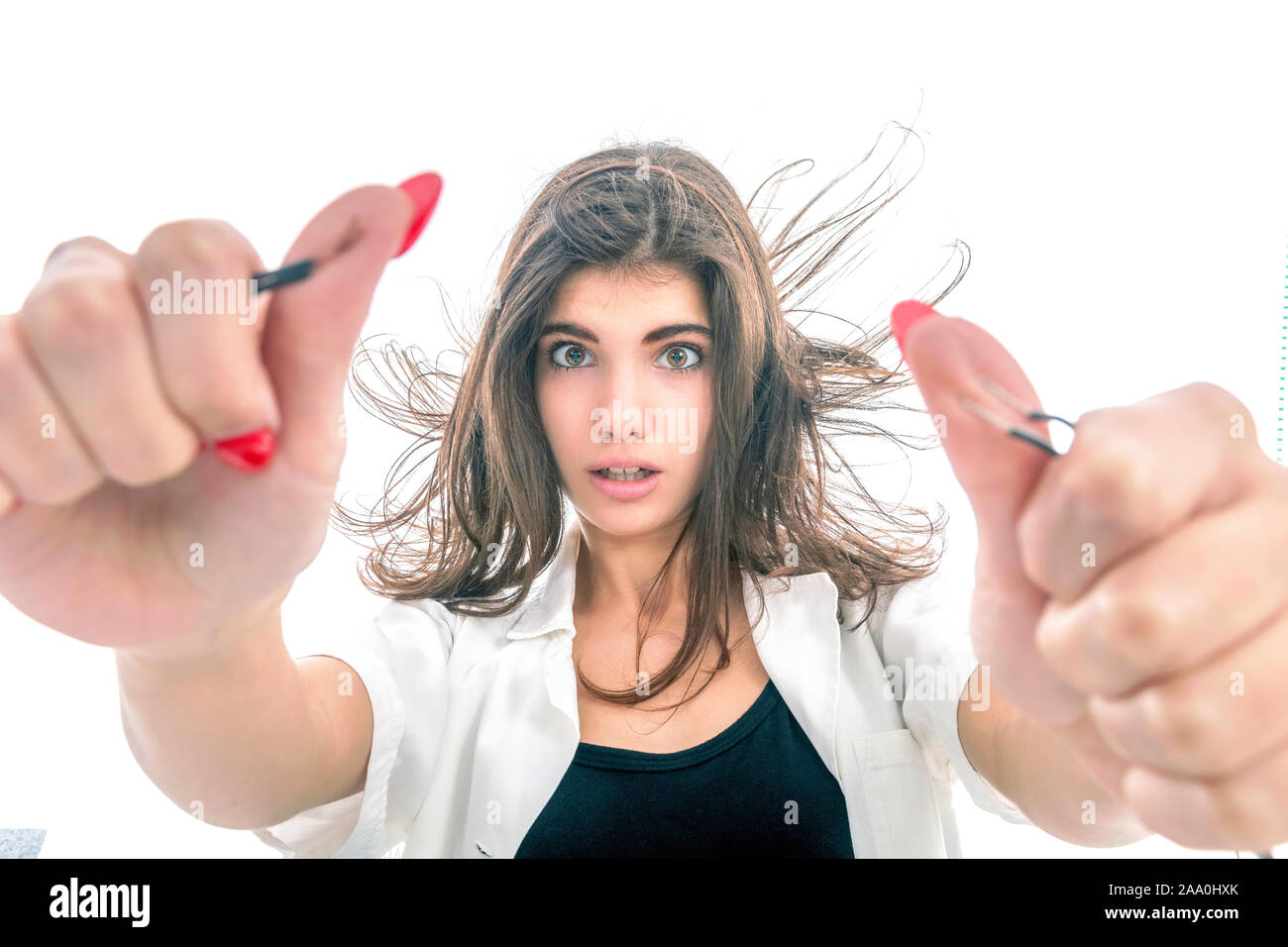 Girl having Electric Shock, electricity problems, Girl holds bare wires ...