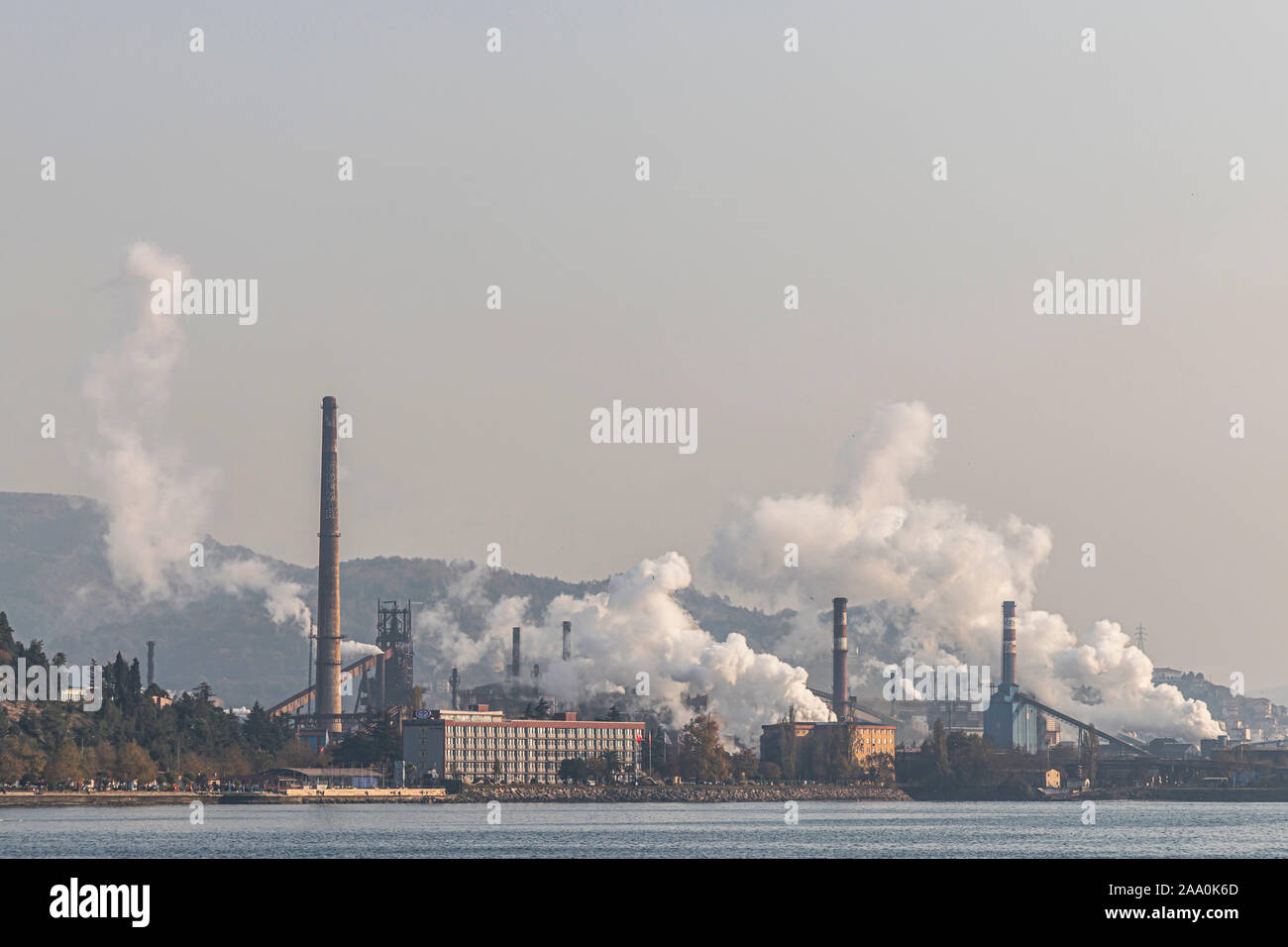 Toxic fumes from the factory cause harm to the environment Stock Photo ...