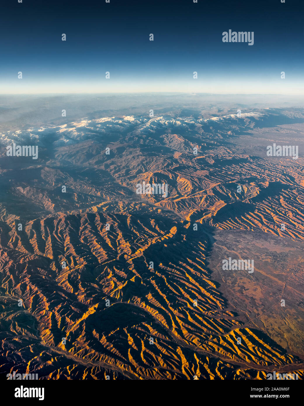 Aerial View from an Airplane. Flying above Beautiful Land at Sunrise ...