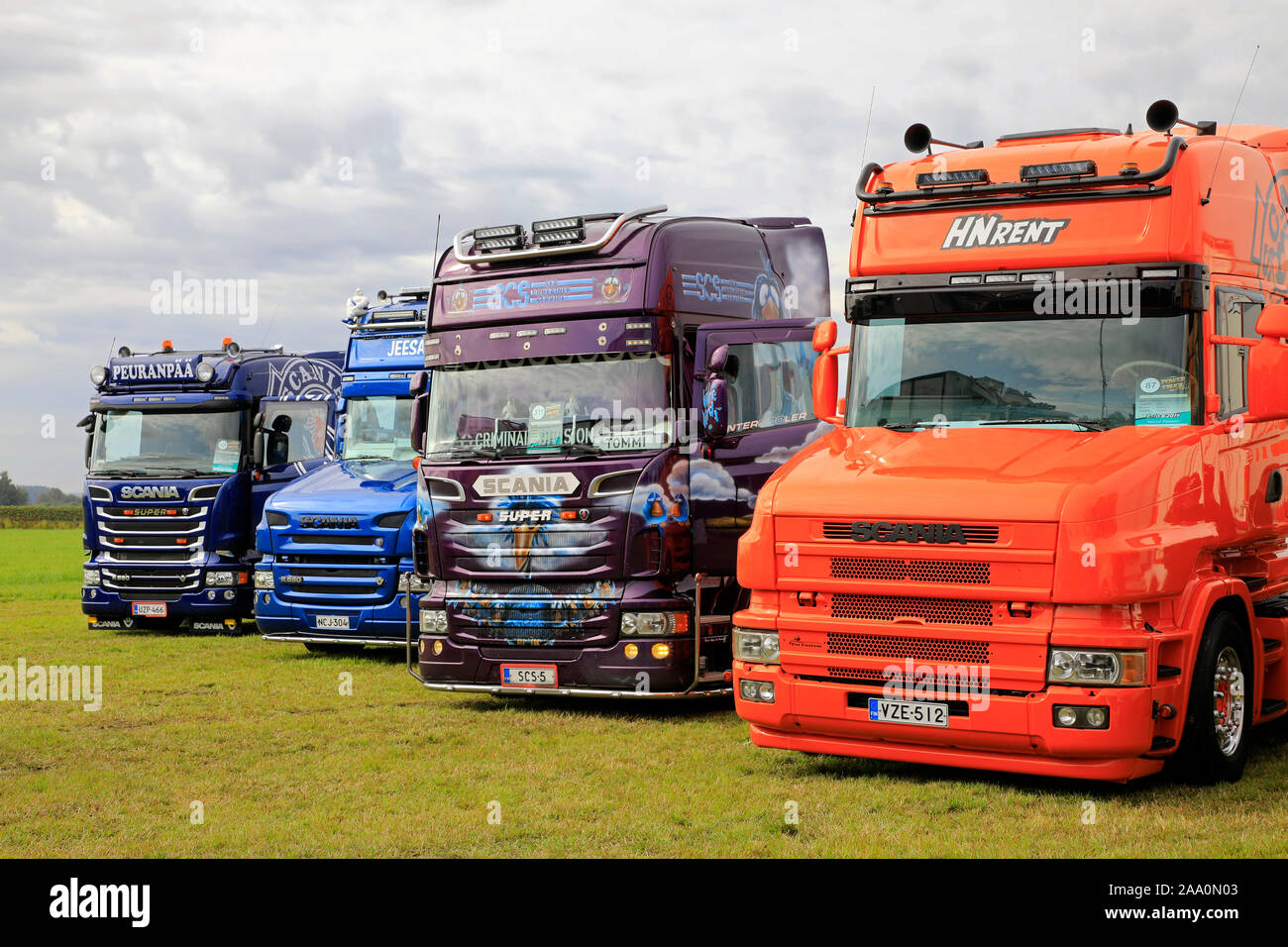 Customised conventional and cab over Scania heavy trucks lined up on ...