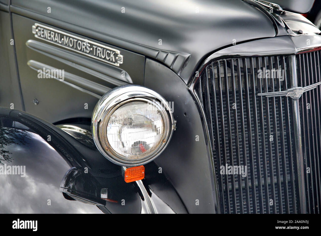 Restored vintage, classic and muscle cars on display at an automobile ...