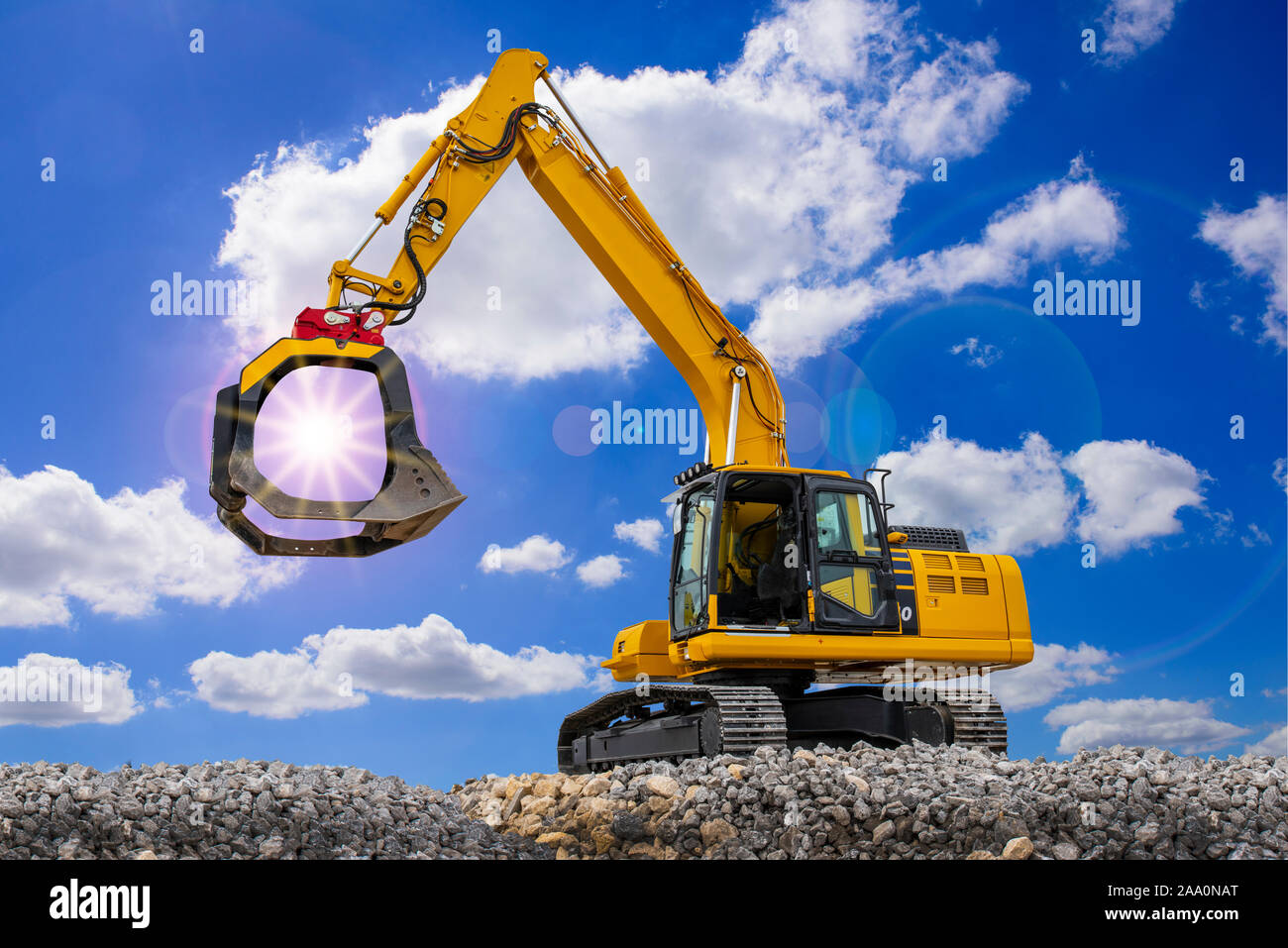 Excavator on a construction site Stock Photo - Alamy