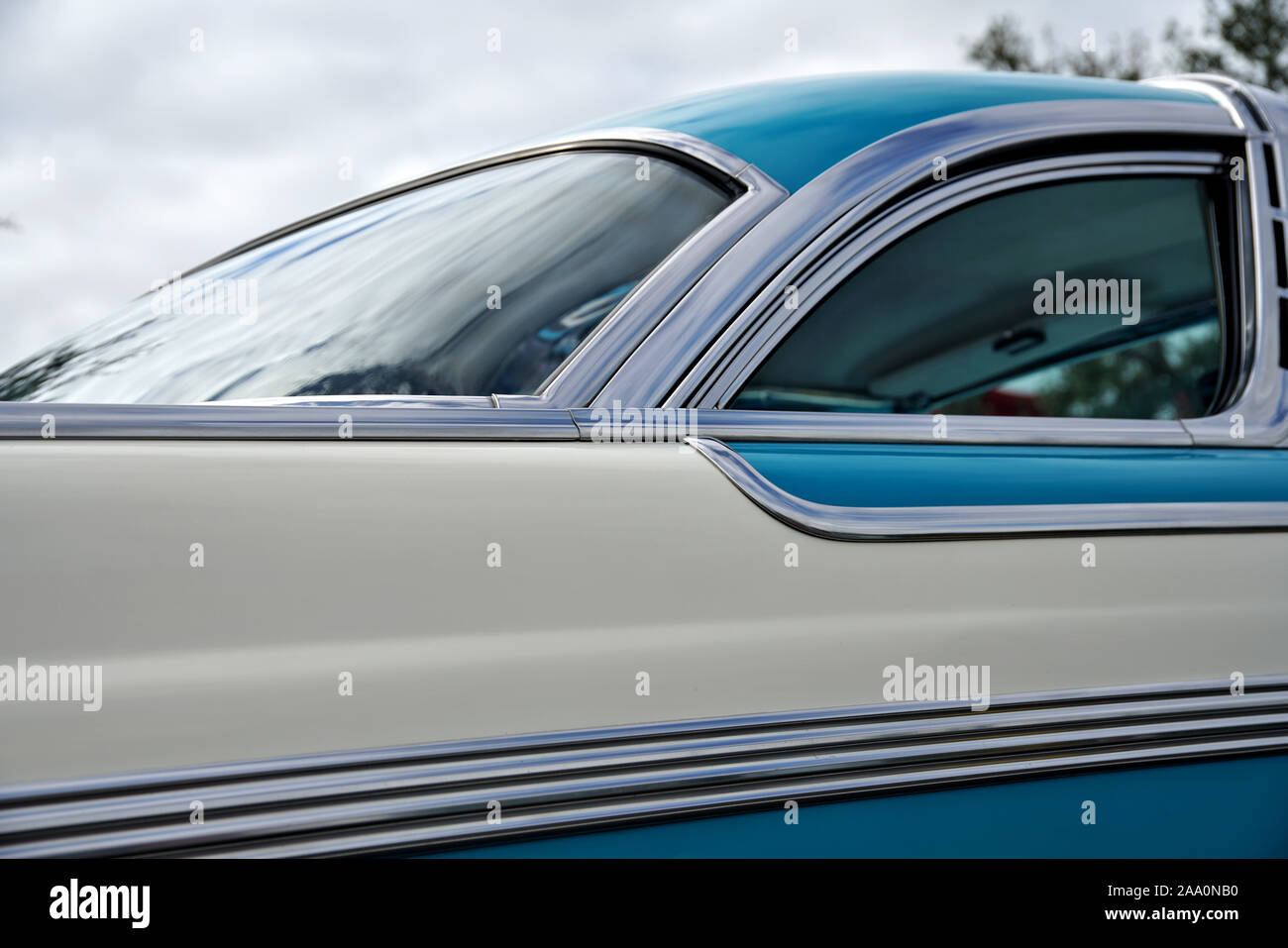 Restored vintage, classic and muscle cars on display at an automobile ...