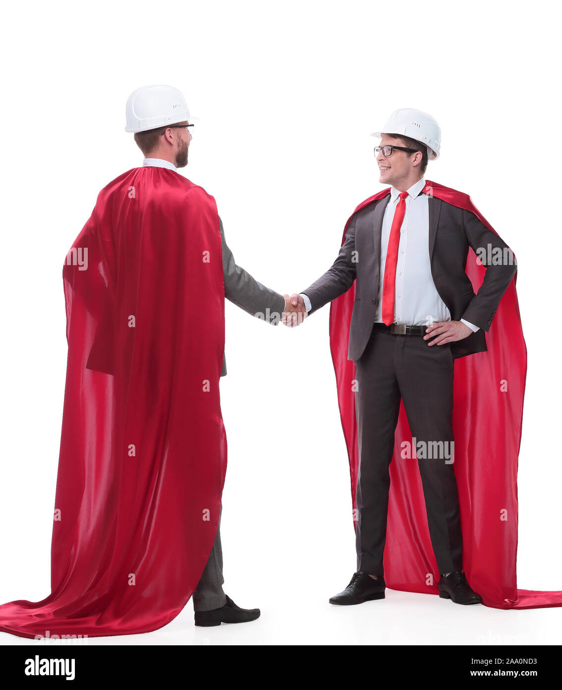 architect and developer in capes super heroes shaking hands Stock Photo ...