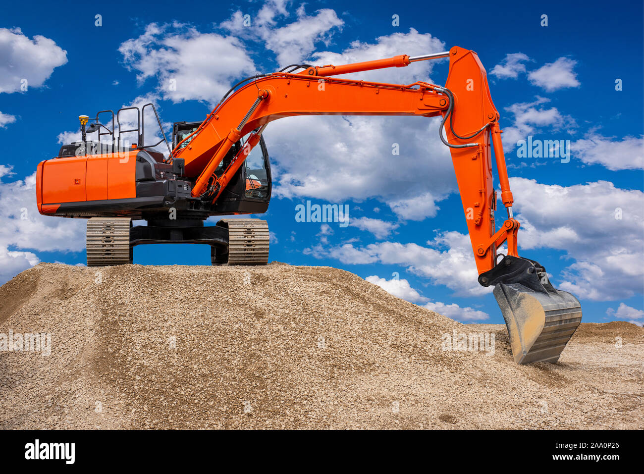 Excavator on a construction site Stock Photo - Alamy