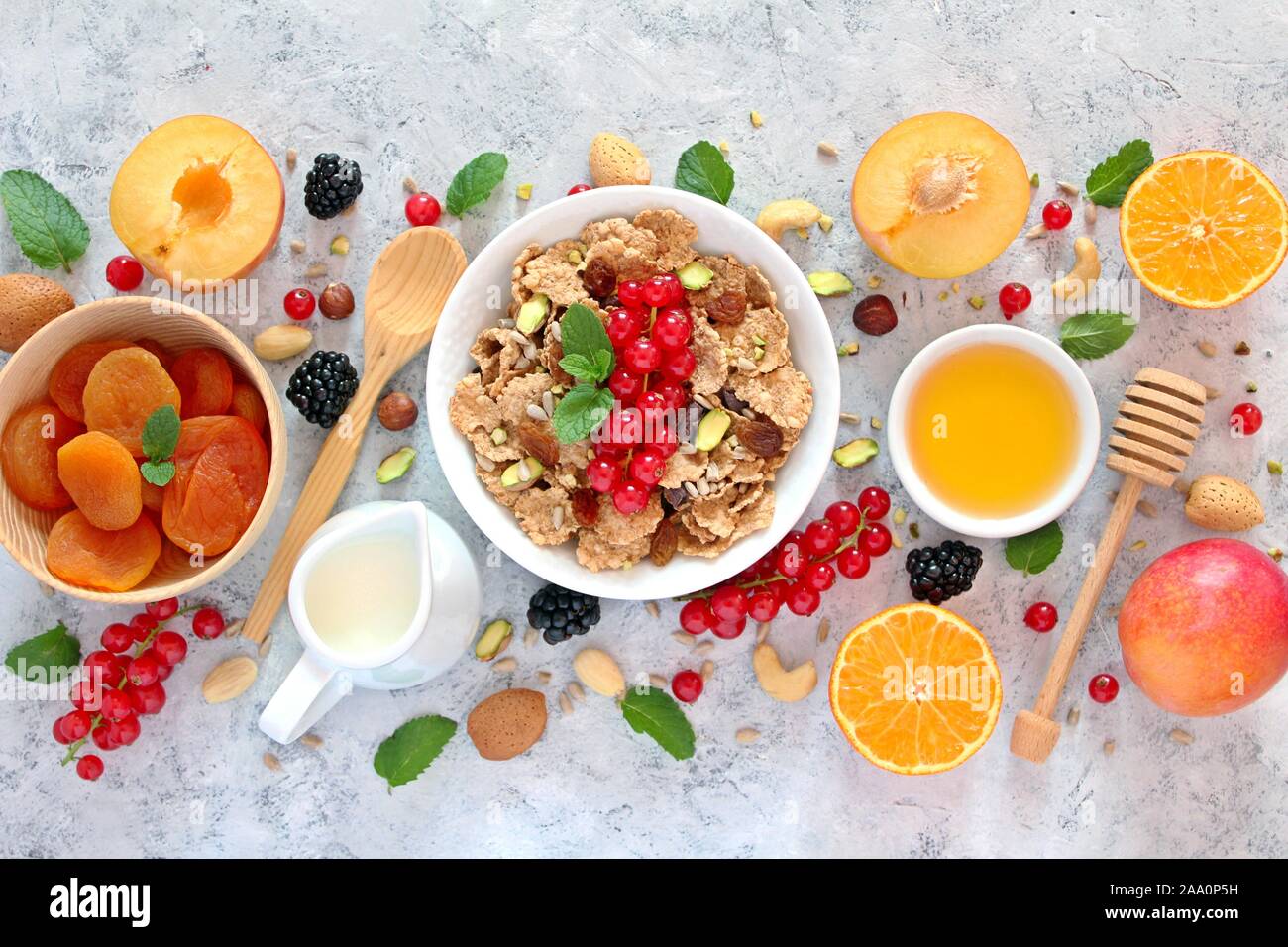 Healthy breakfast ingredients on light background. Top view with copy ...