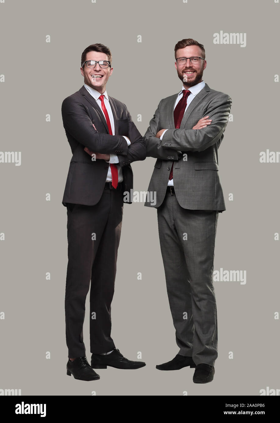 in full growth. two business men standing together Stock Photo - Alamy