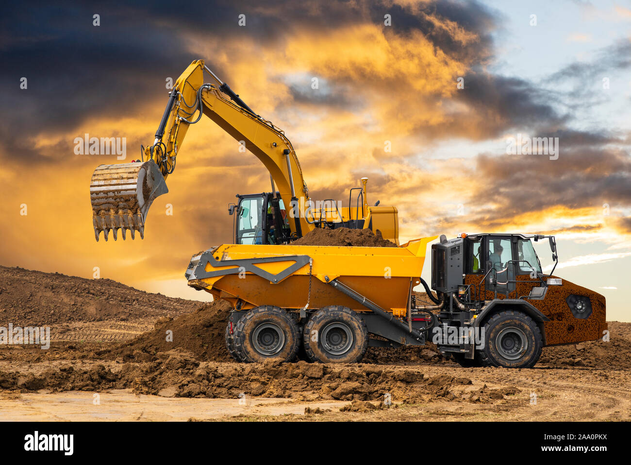 Excavator on a construction site Stock Photo - Alamy