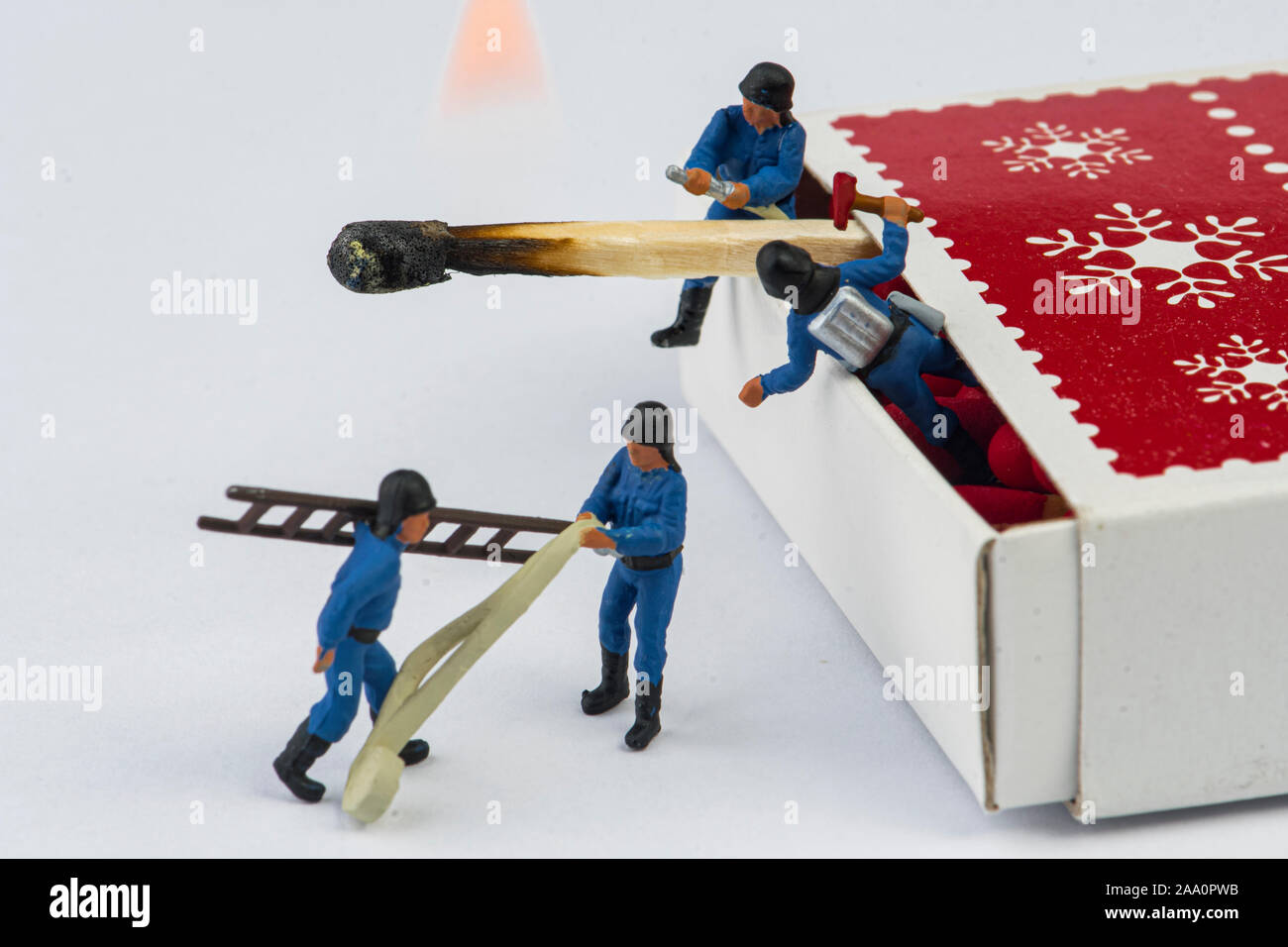 mini figures in matchbox Firefighters Stock Photo - Alamy