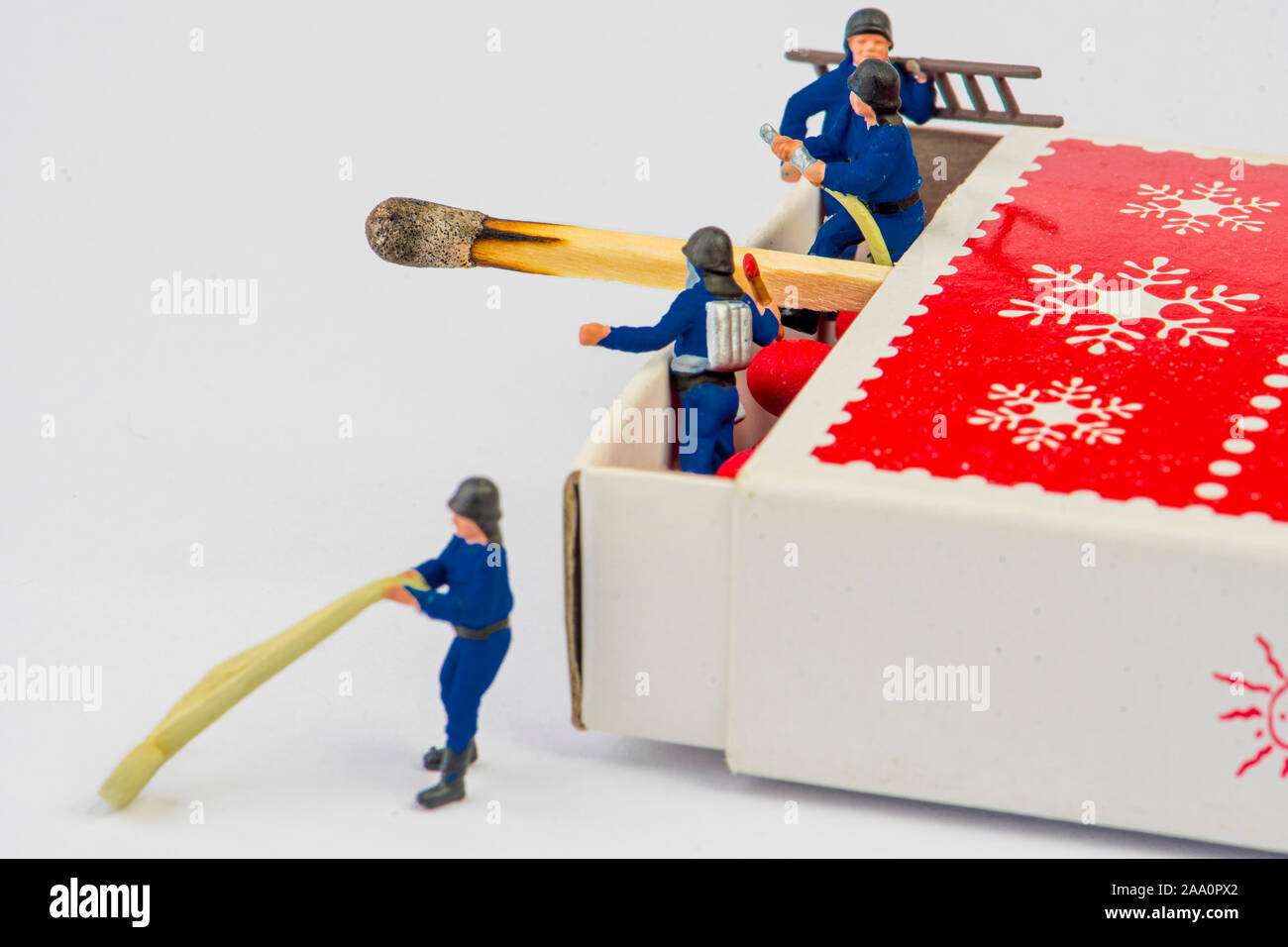 mini figures in matchbox Firefighters Stock Photo - Alamy