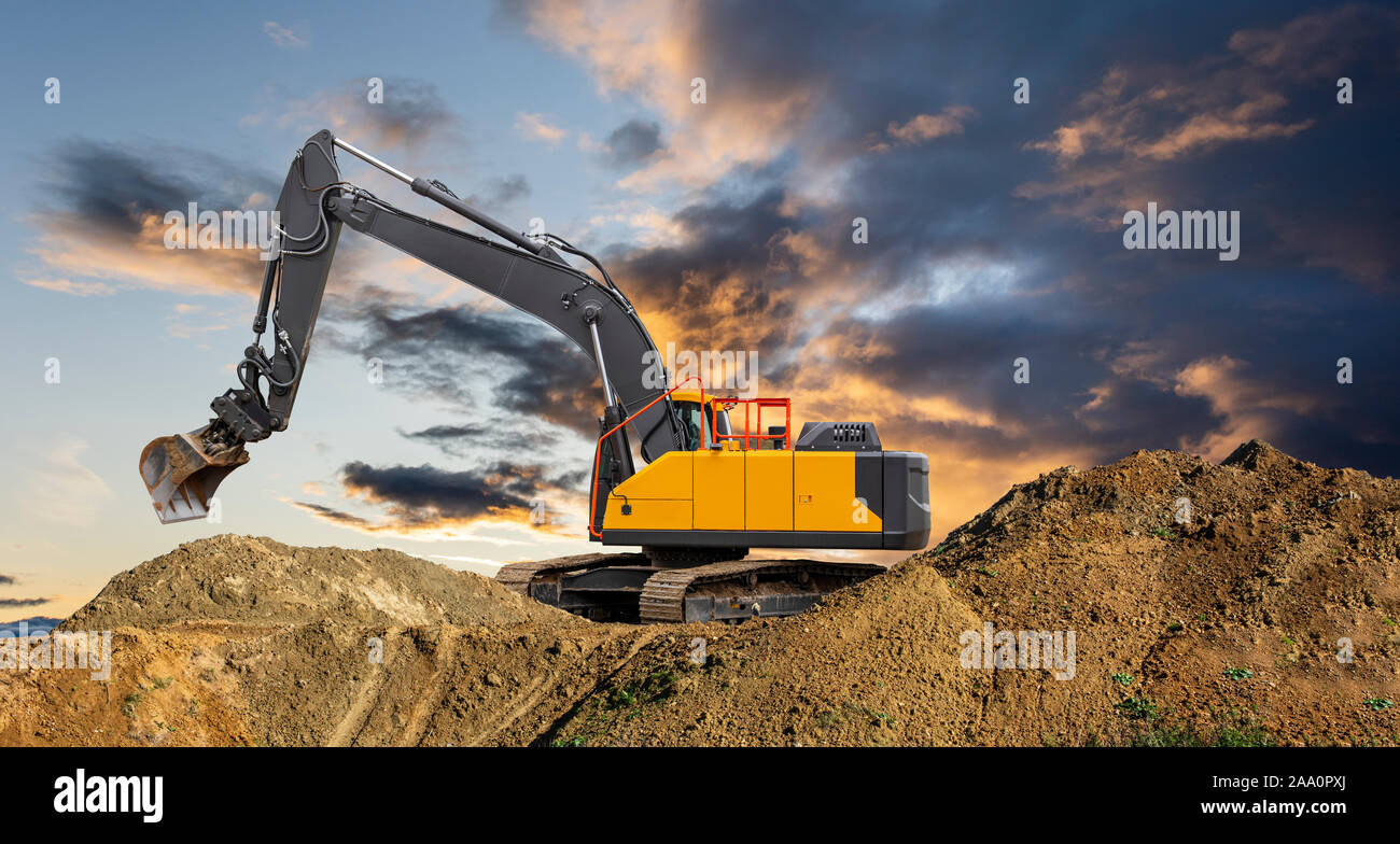 Excavator on a construction site Stock Photo - Alamy