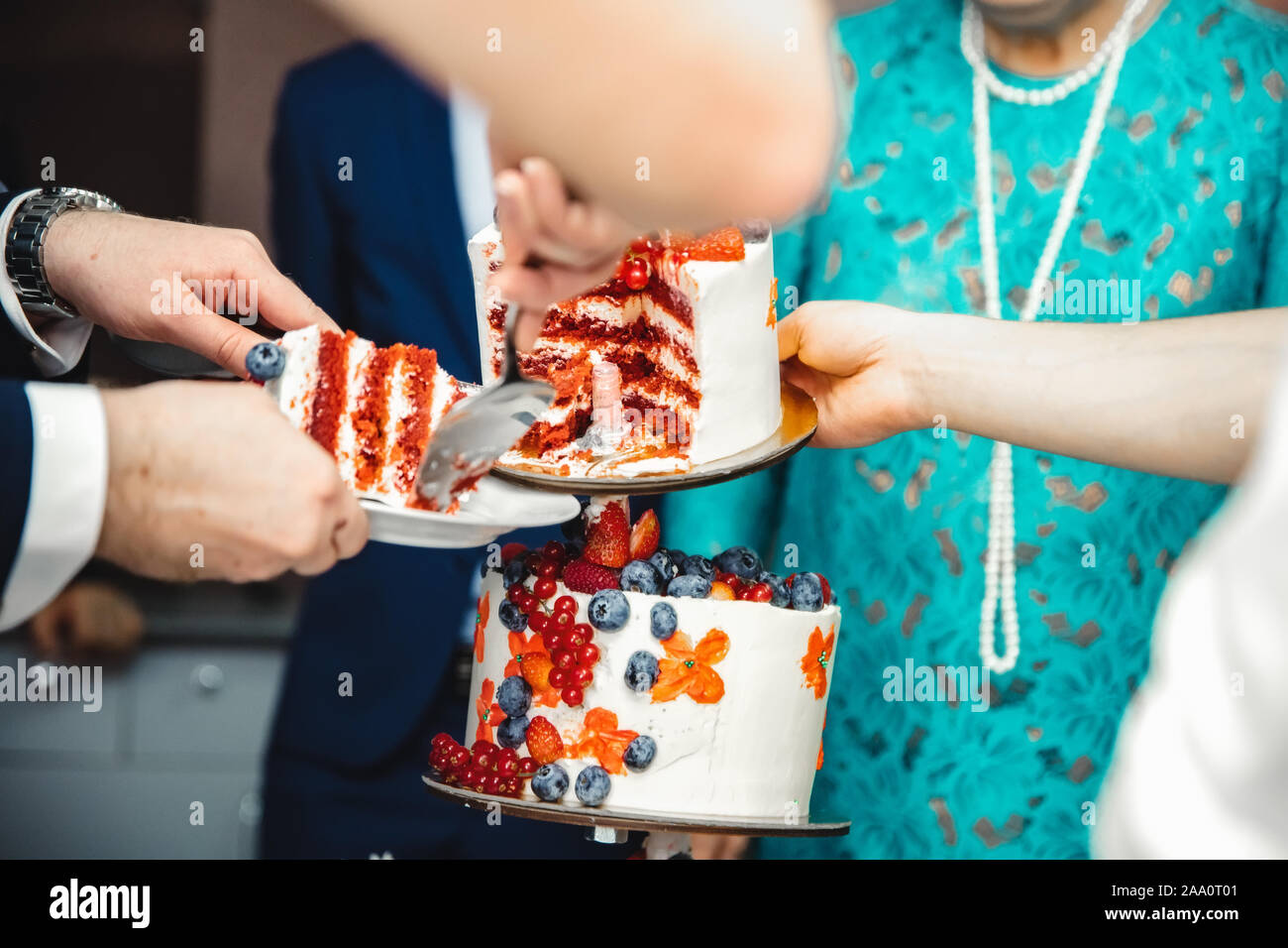 Handing cake hi-res stock photography and images - Alamy