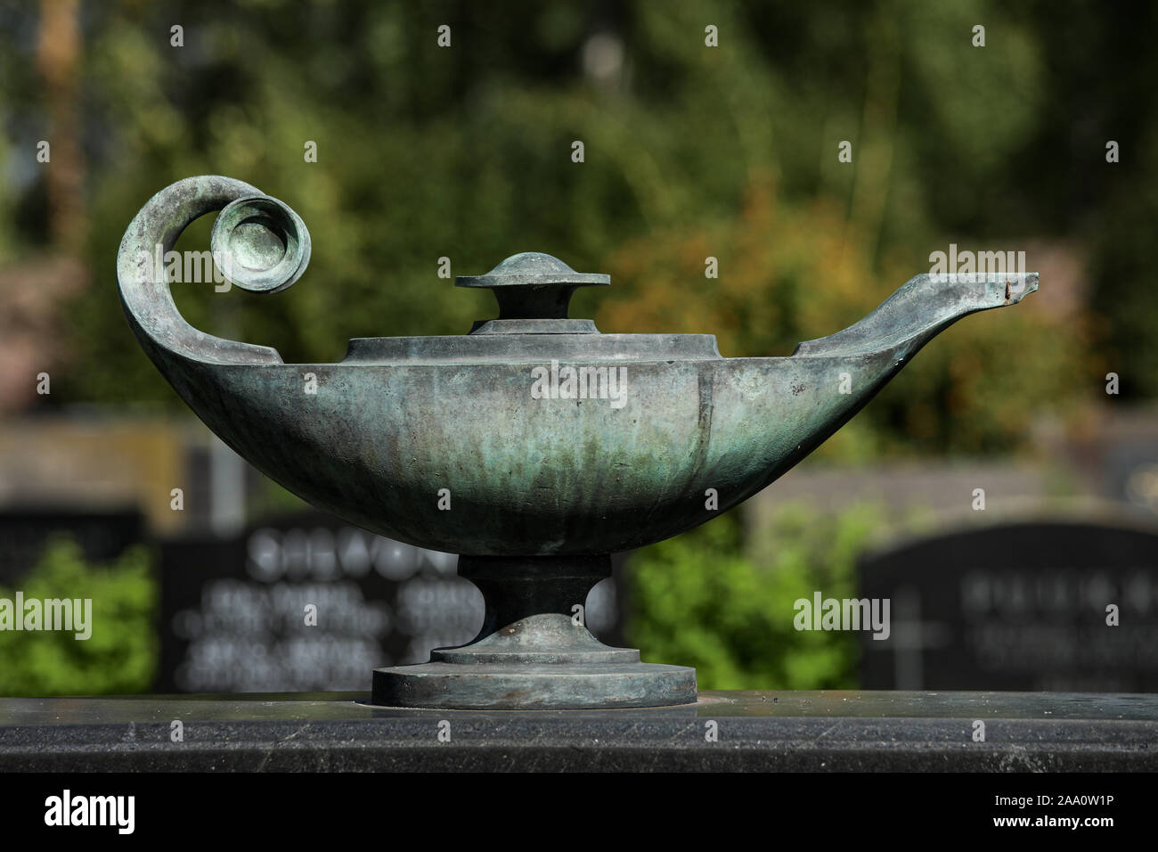 Funerary art on gravestone in Hietaniemi Cemetery Stock Photo - Alamy