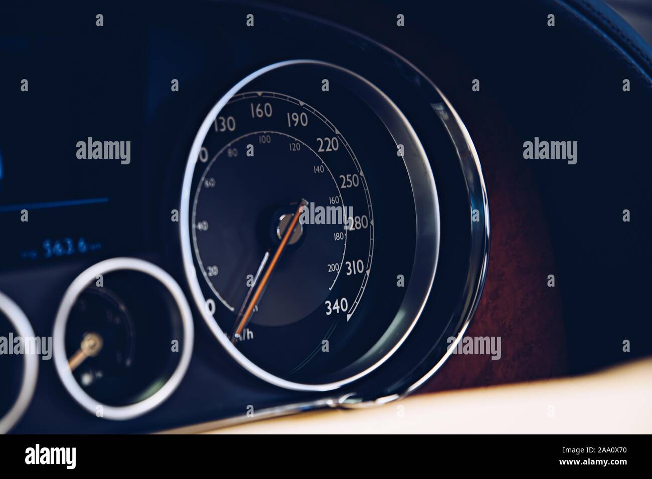 Luxury car speedometer and dashboard Stock Photo - Alamy