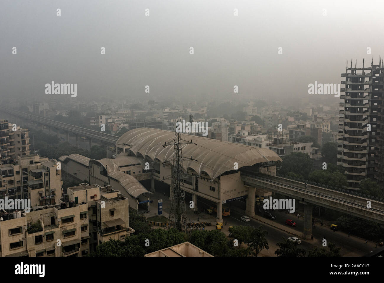 The unhealthy smog and haze hanging over the rapid metro at Sector 55 ...