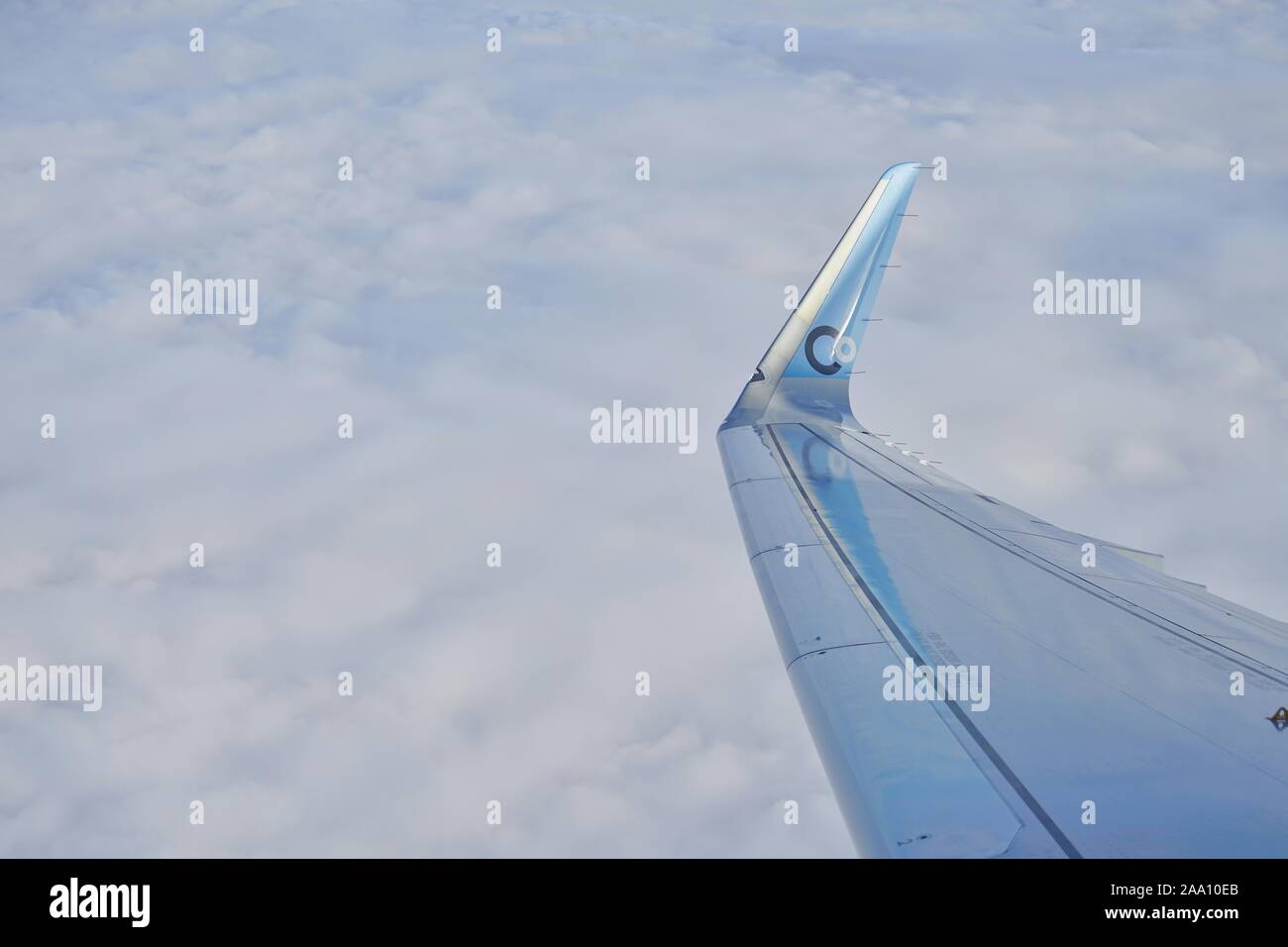 ORLY, FRANCE -16 NOV 2019- Sky view of the blue and white winglet of an ...