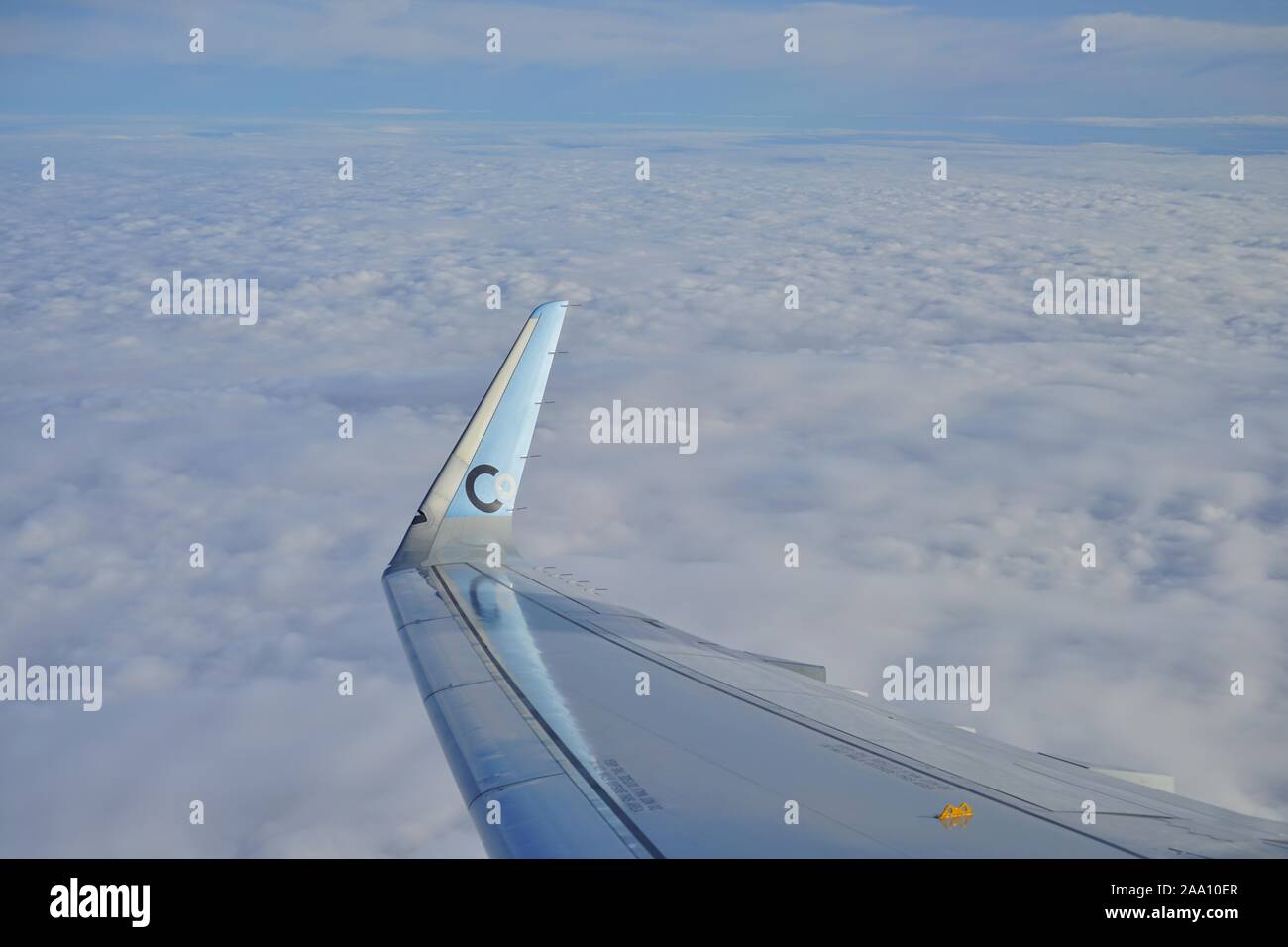 ORLY, FRANCE -16 NOV 2019- Sky view of the blue and white winglet of an ...