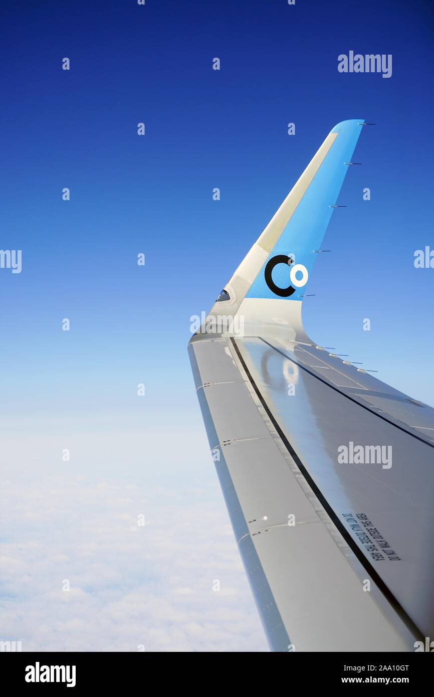 ORLY, FRANCE -16 NOV 2019- Sky view of the blue and white winglet of an ...