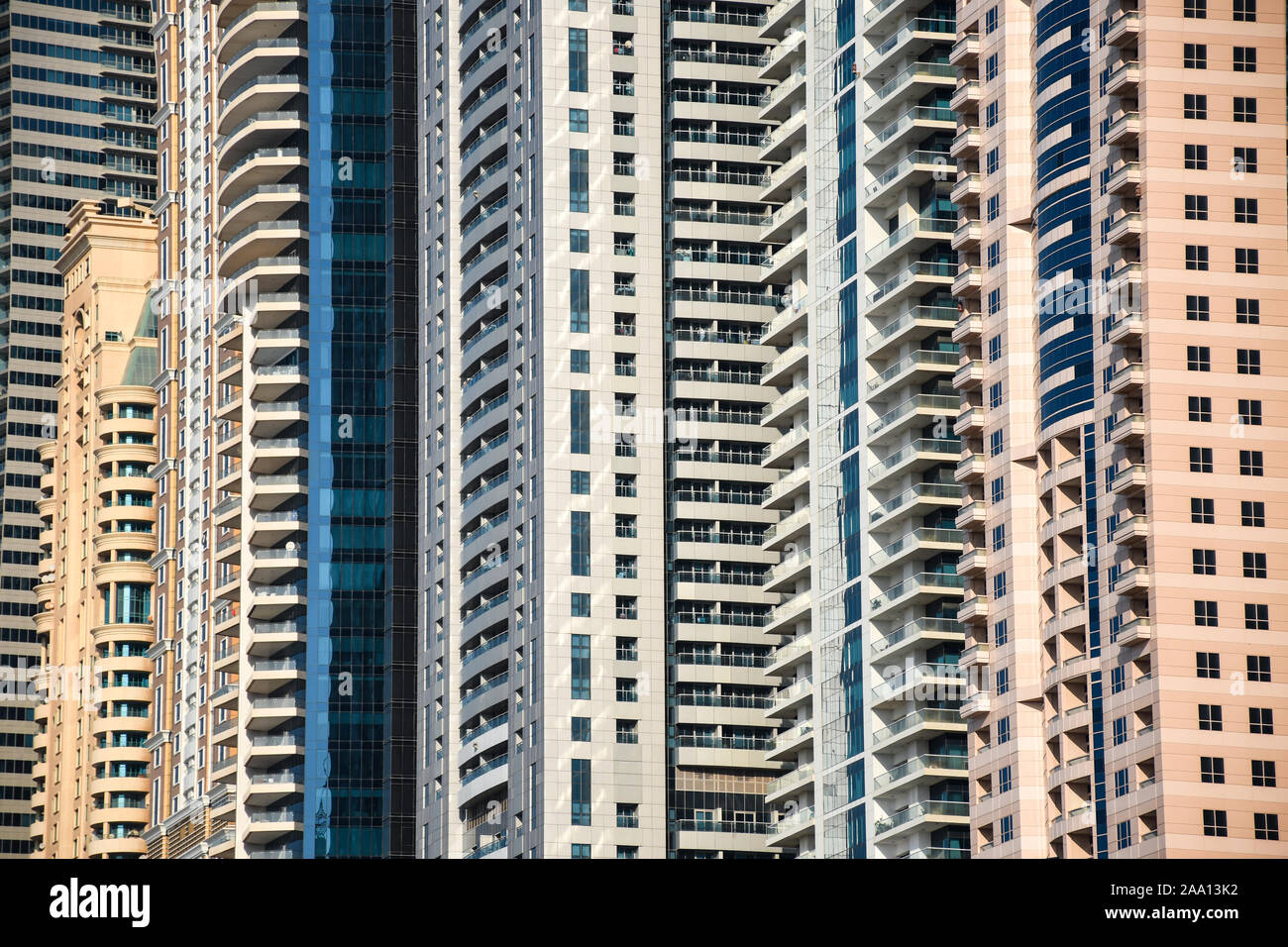 Very high skyscrapers close up of windows and balcony's of crowded ...