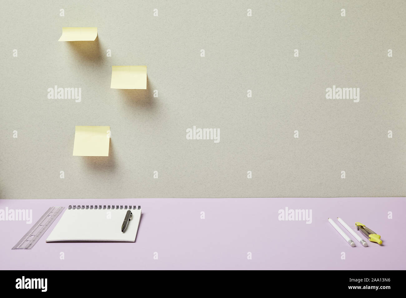 notebook near pen, ruler and sticky notes on grey and purple Stock ...