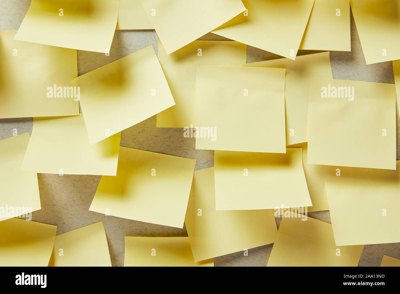 blank yellow sticky notes on grey Stock Photo - Alamy