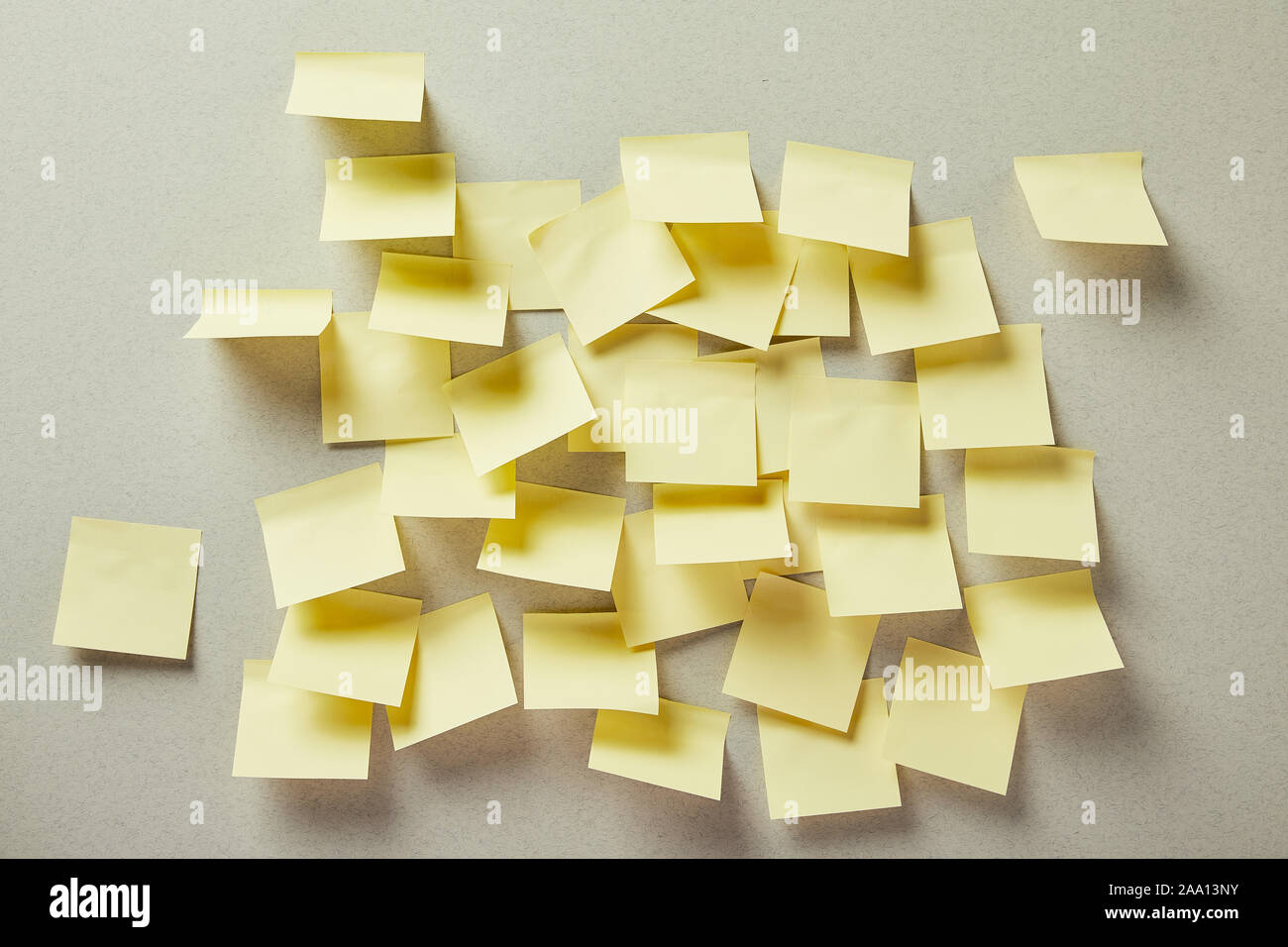 yellow and empty sticky notes on grey Stock Photo - Alamy