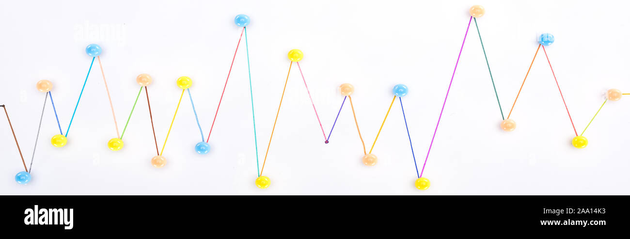 top view of colorful connected drawn lines with pins, connection ...