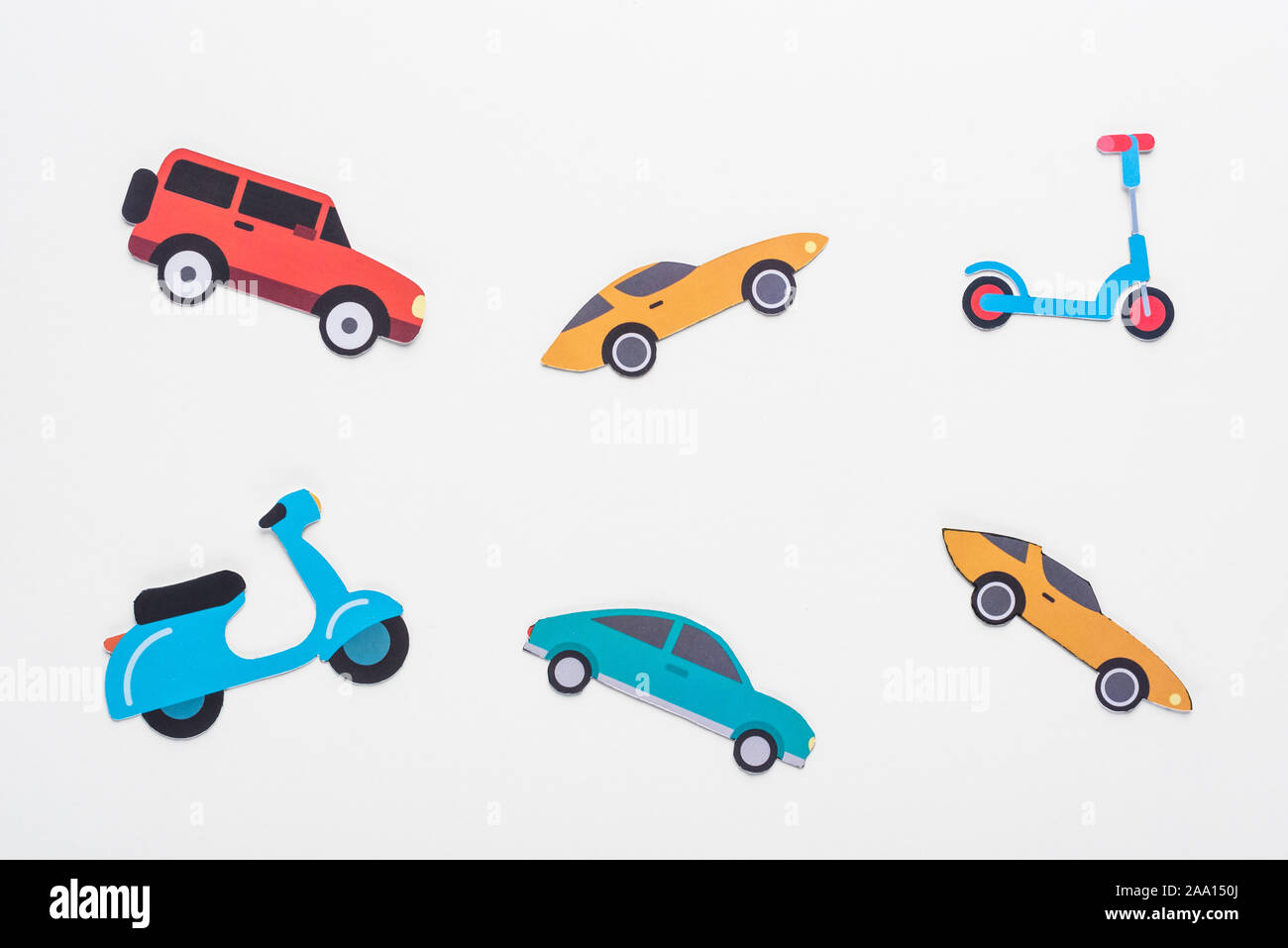 top view of paper cut vehicles on white background Stock Photo - Alamy