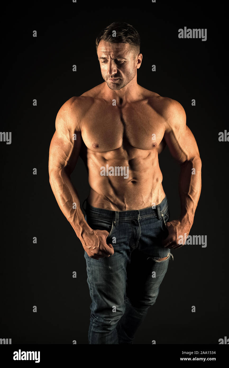 Macho handsome with muscular torso. Attractive guy muscular body. Proud ...