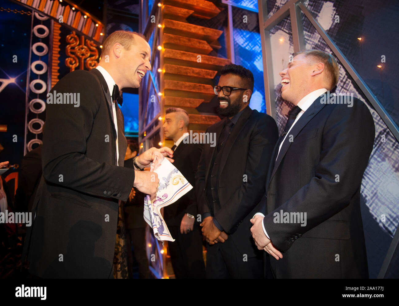 The Duke of Cambridge (left) talks with Romesh Ranganathan (centre) and ...