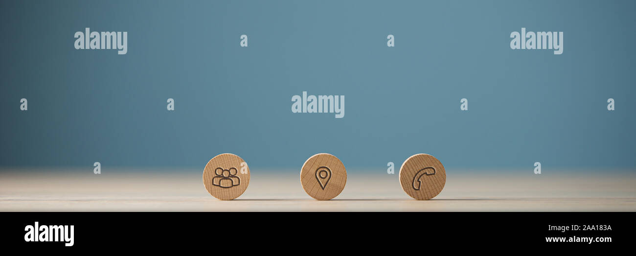 Wide view image of three wooden cut circles with contact and ...