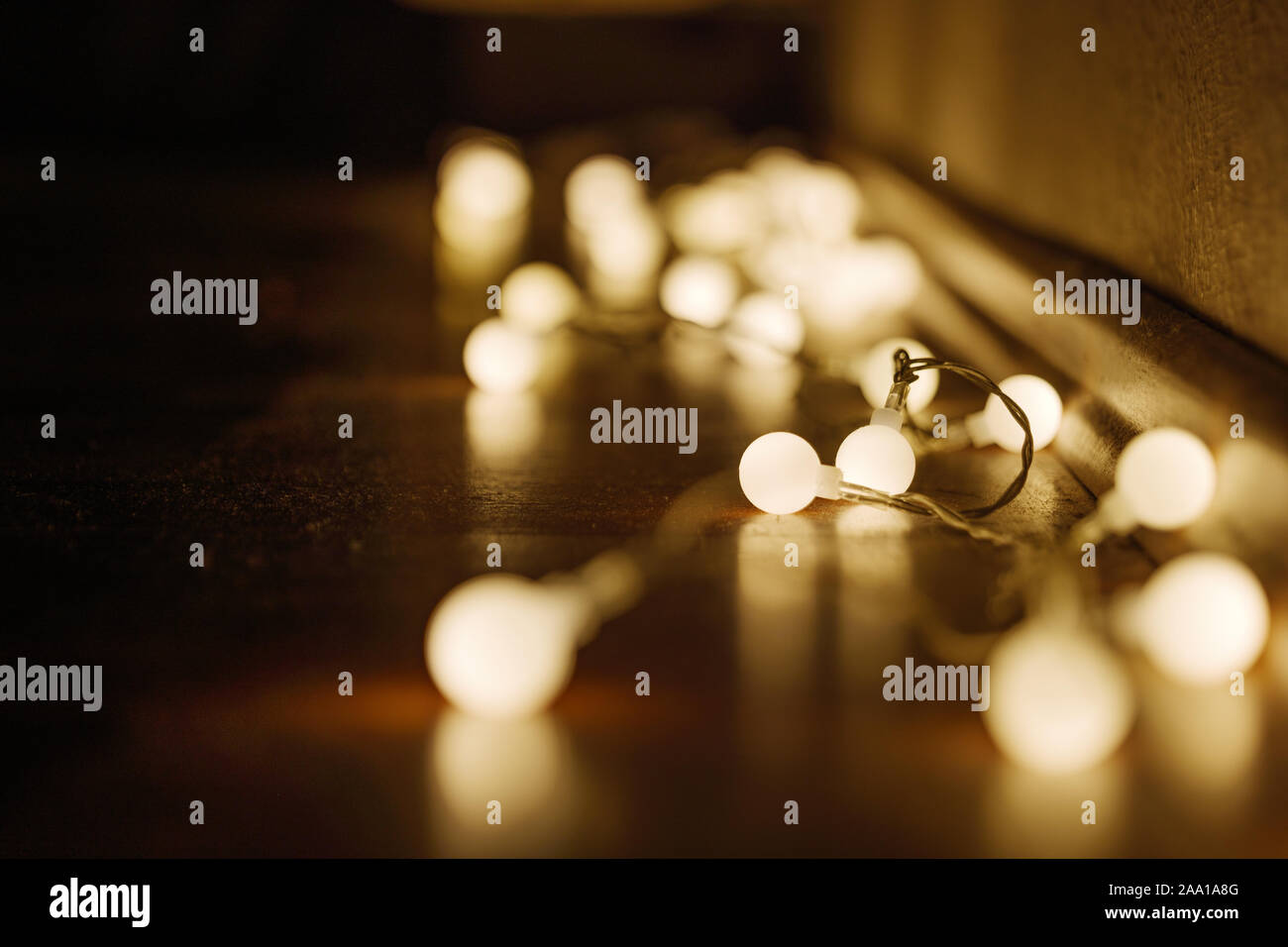 Close up view of decorative wire led small warm white light bulbs lay ...