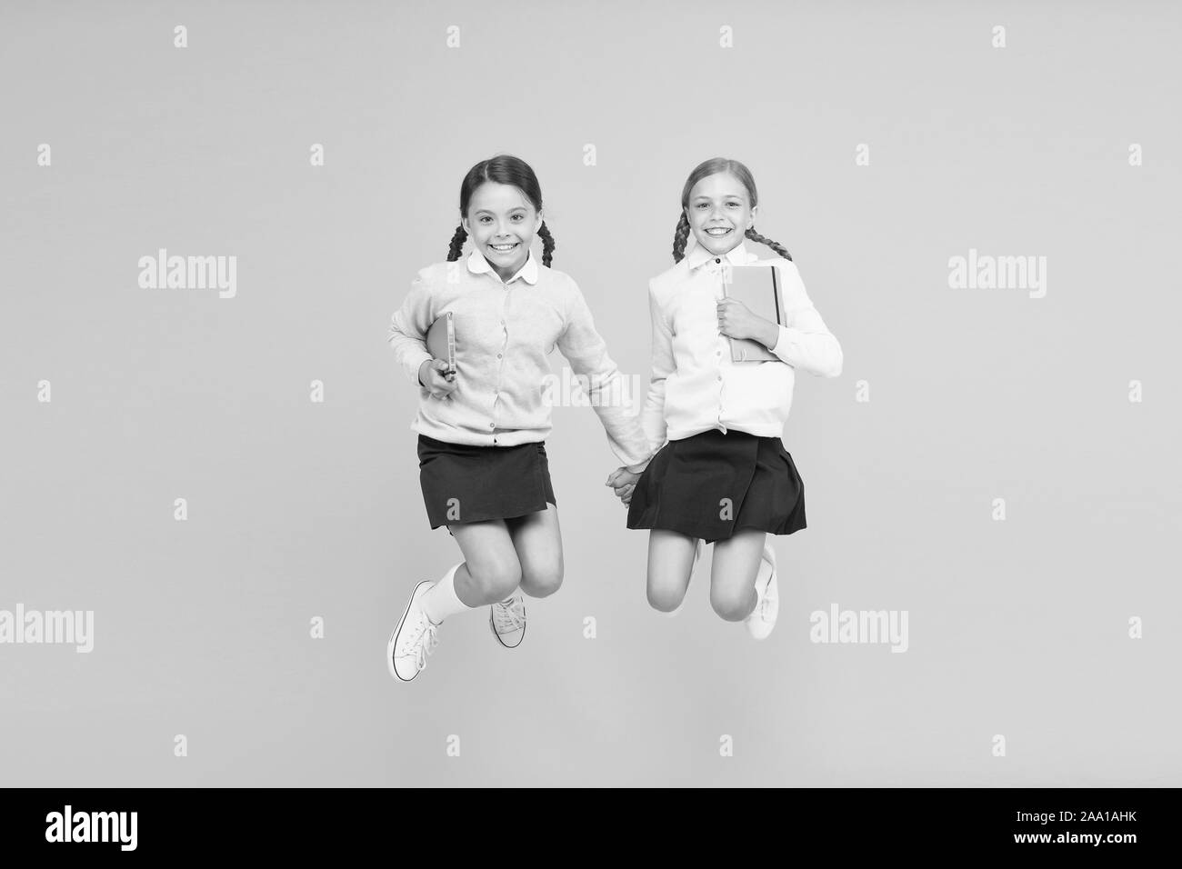 Children jumping school elementary Black and White Stock Photos ...
