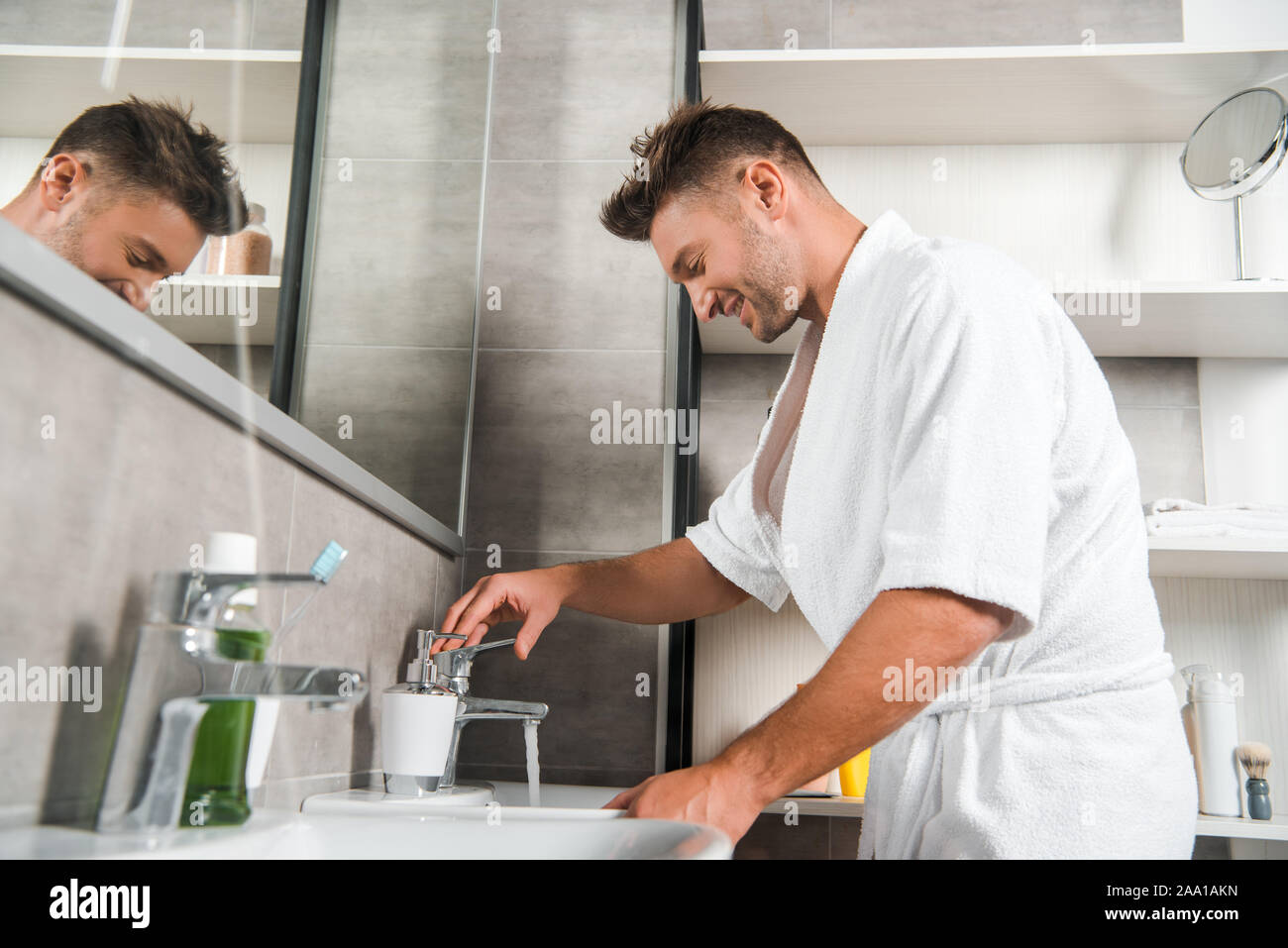 Man in bathtub hi-res stock photography and images - Alamy