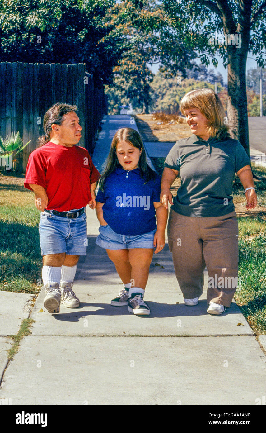 Dwarf parents and their daughter take a stroll in Riverside, CA Stock ...