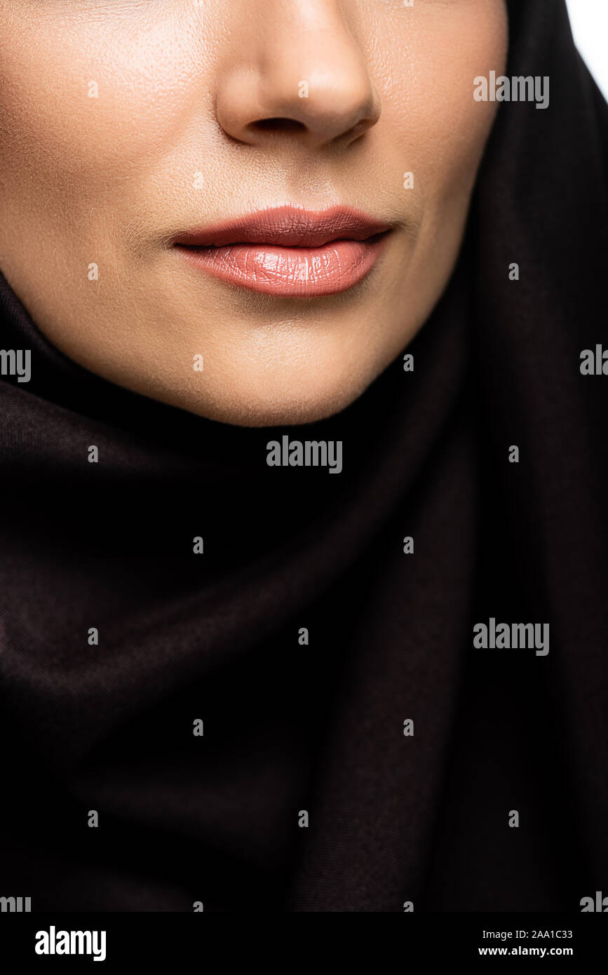 cropped view of beautiful young Muslim woman lips isolated on white ...