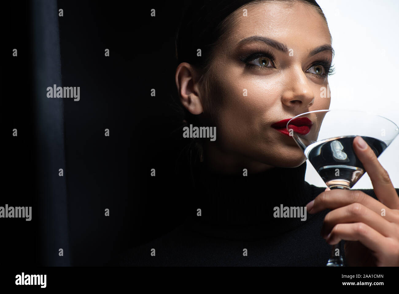 beautiful elegant woman with red lips drinking martini isolated on ...