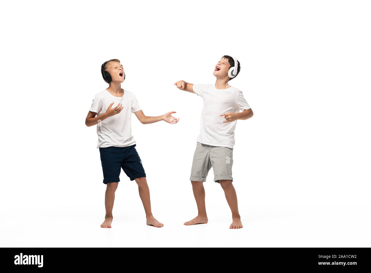 Two boys singing Cut Out Stock Images & Pictures - Alamy