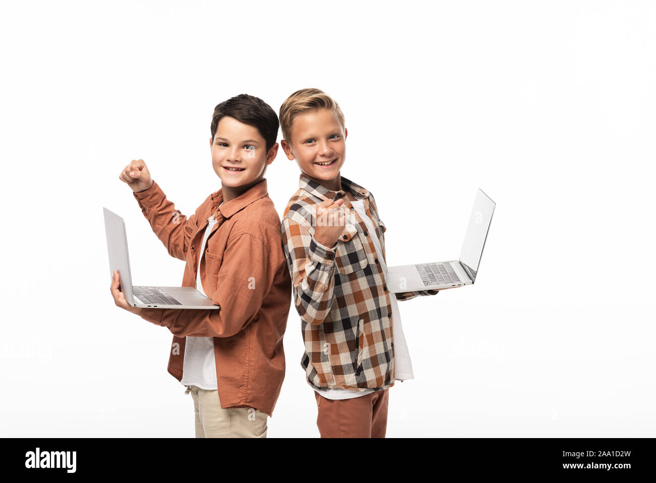Celebrating kids on laptops hi-res stock photography and images - Alamy