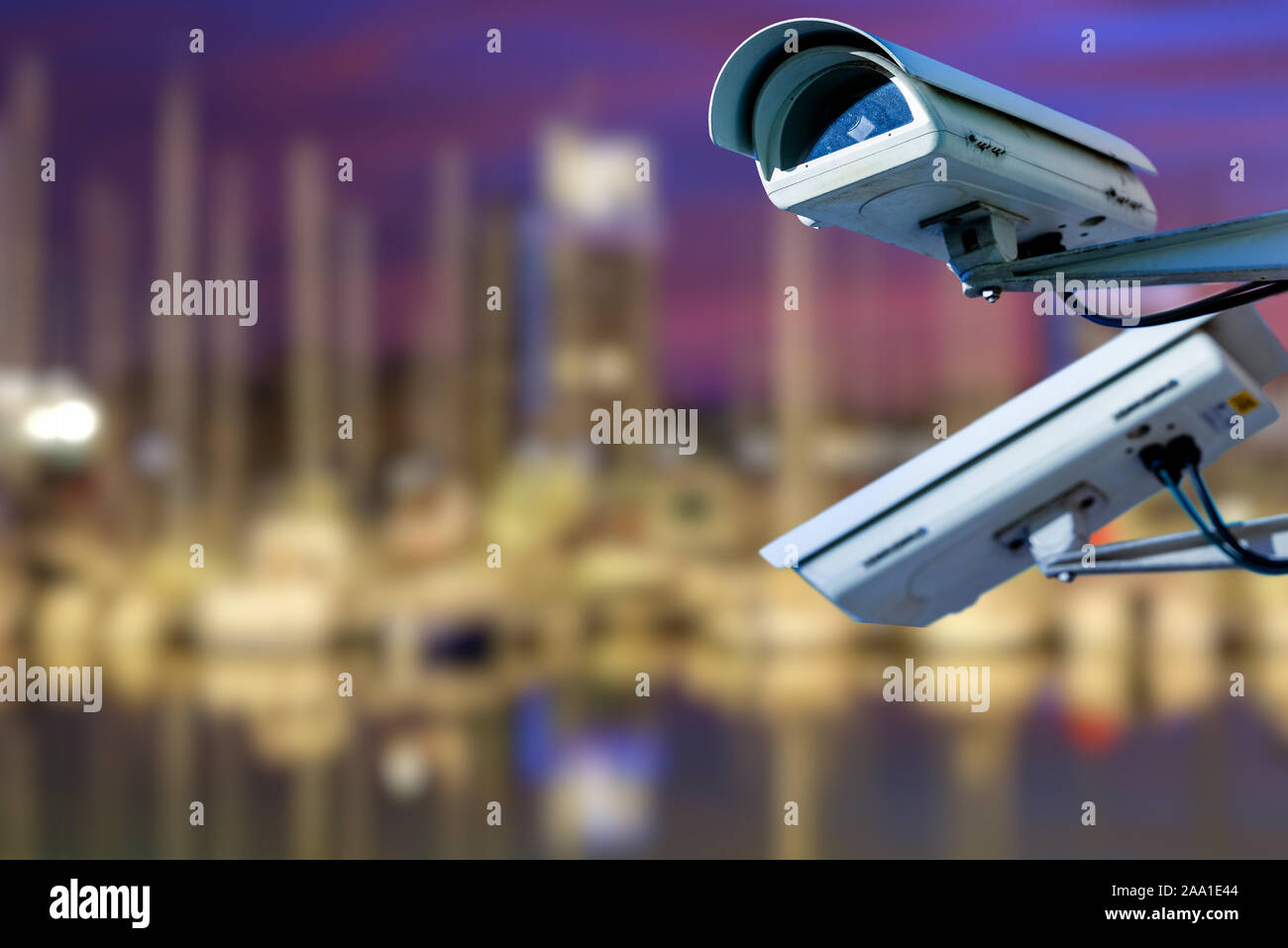 CCTV camera concept with illuminated marina on blurry background Stock ...