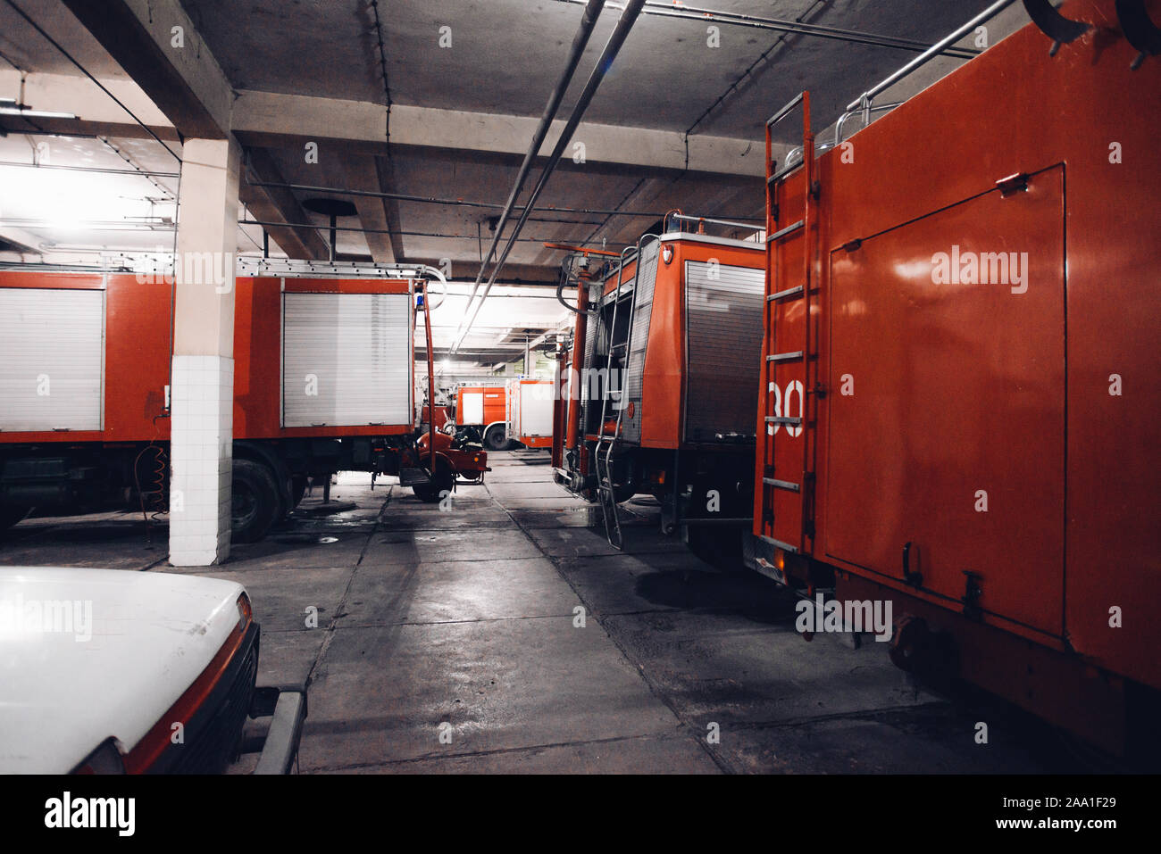 Vehicles used for eliminating fire hazards parked at a fire station ...