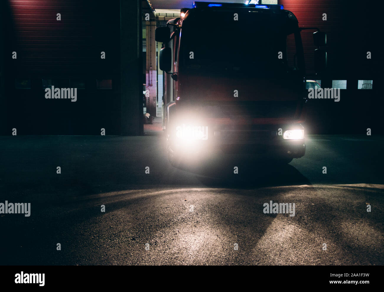 Fire truck going out for a firefighting operation Stock Photo - Alamy