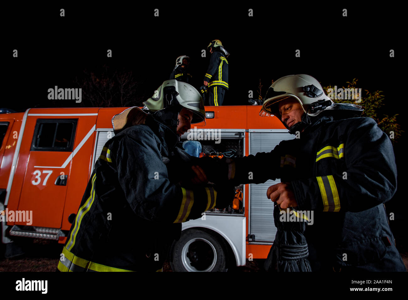 Fire station crew responding to fire emergency situation Stock Photo ...