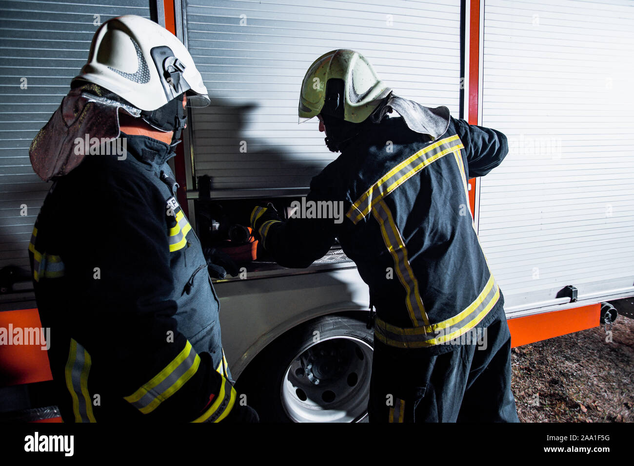 Fire department in the field during a fire emergency situation Stock ...