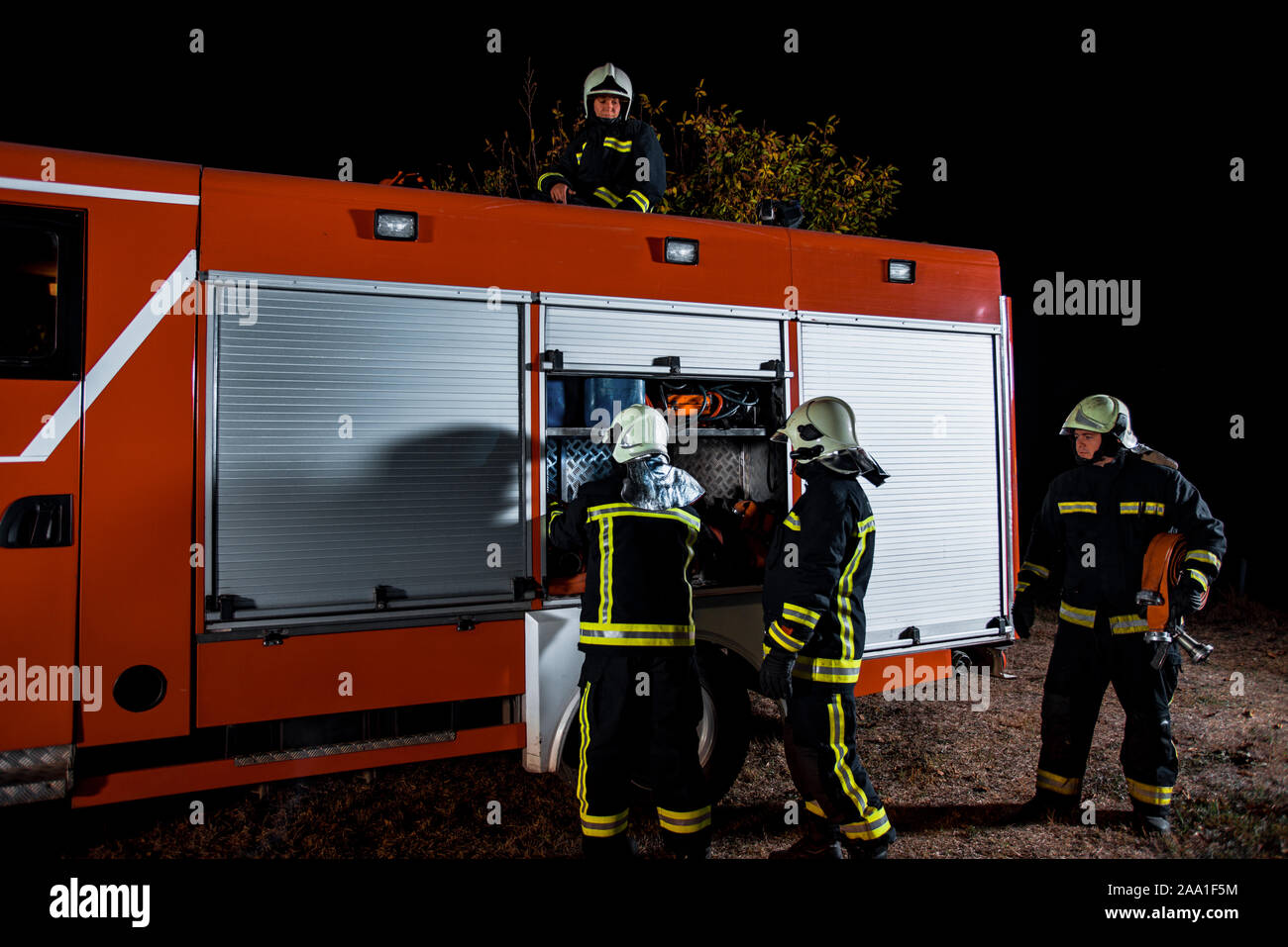 Fire station crew responding to fire emergency situation Stock Photo ...