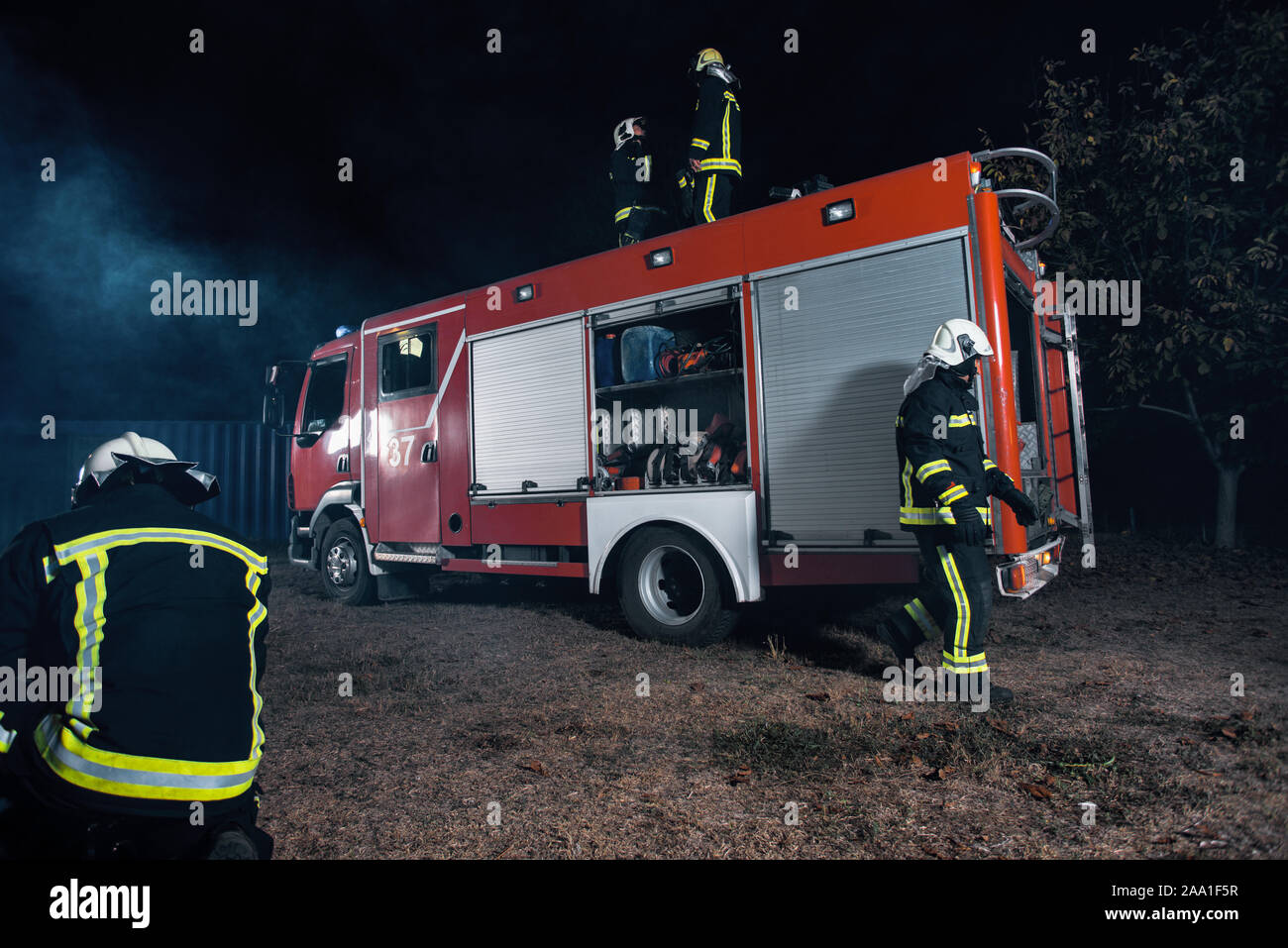 Firefighting crew preventing fire from spreading in the region Stock ...