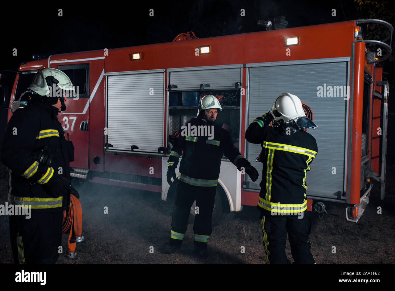 Fire station crew responding to fire emergency situation Stock Photo ...