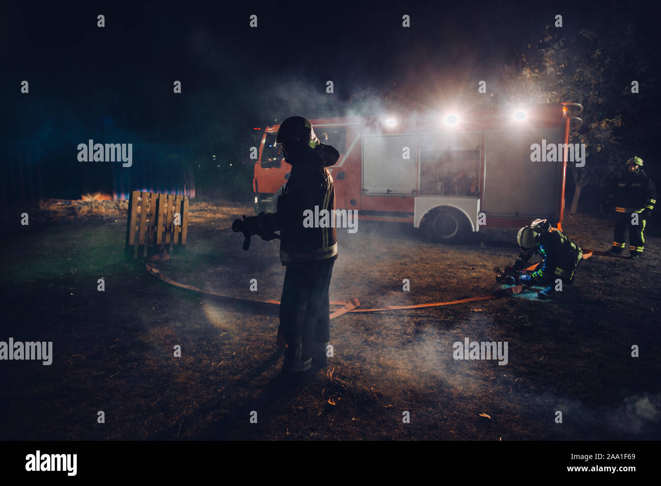 Fire department in the field during a fire emergency situation Stock ...