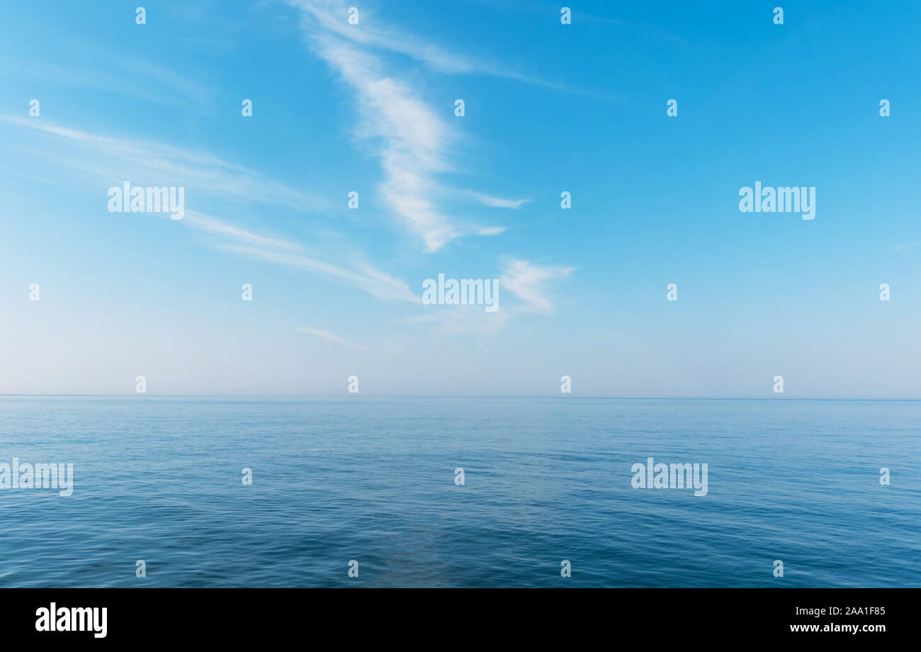 Boat cruising the sea leaving wake on a brilliant sunny day. Beautiful ...